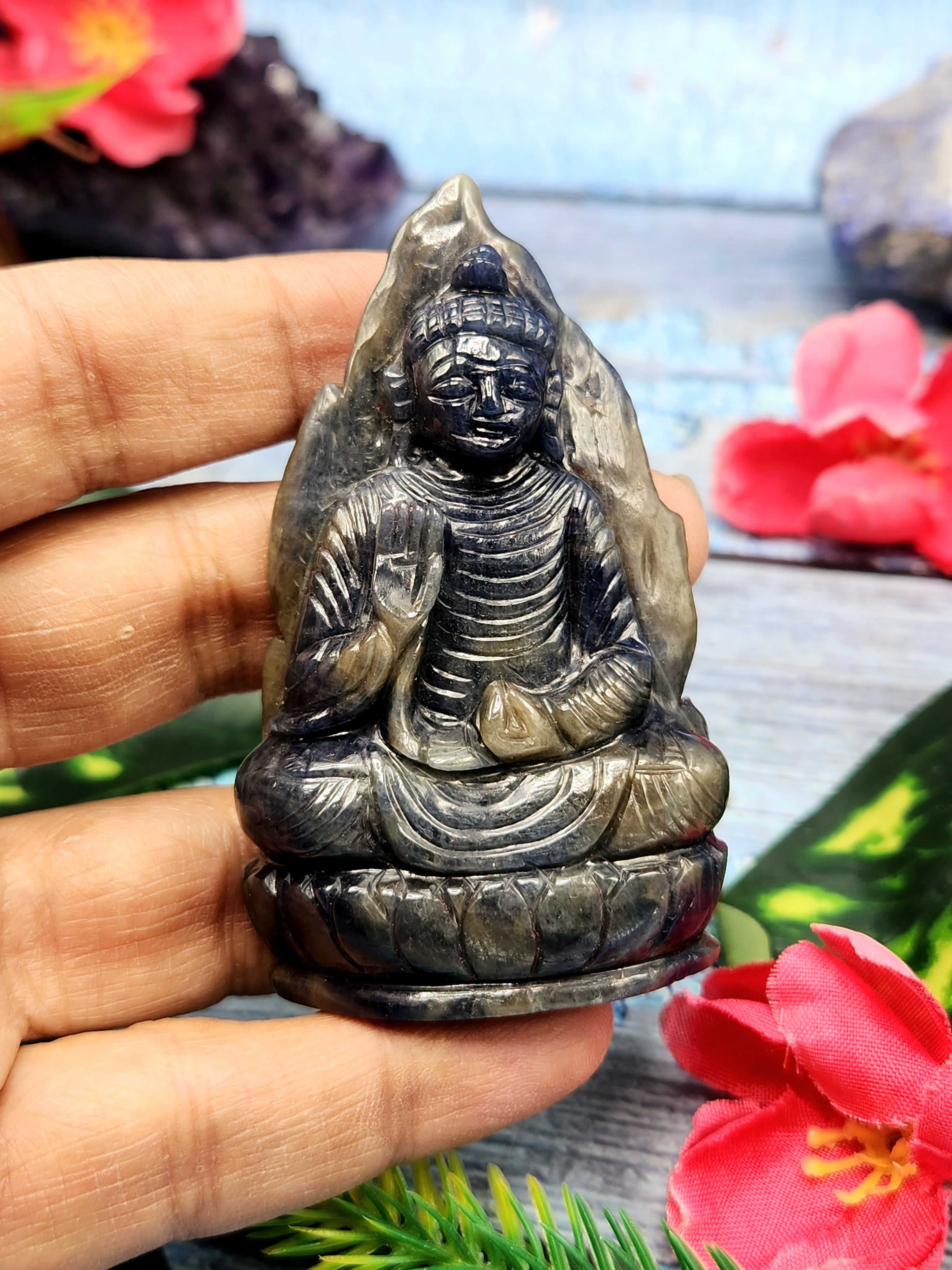 Lord Buddha Carving in Blue Sapphire Stone - A Symbol of Spiritual Enl